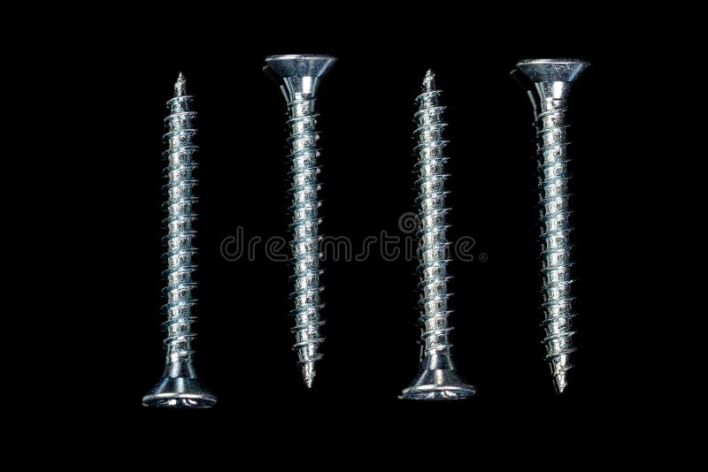 Macro Screws on a Black Background Stock Photo - Image of metal, object ...