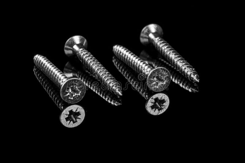 Macro Screws on a Black Background Stock Image - Image of machine ...