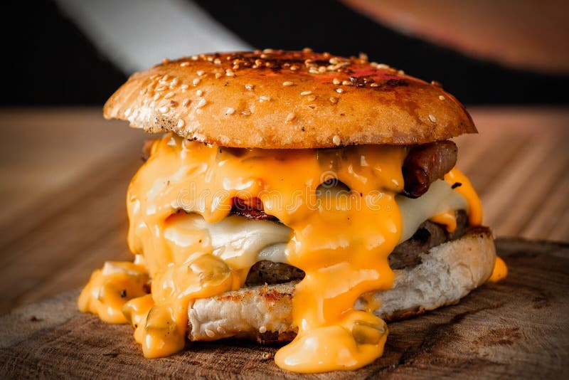 Macro Selective Focus Shot of a Delicious Burger with Melted Cheese ...