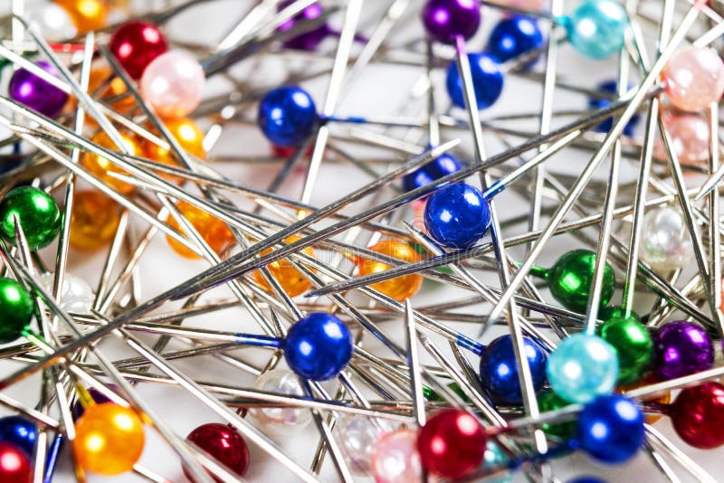 Macro Shot Background of Multicolored Sewing Needles with Colored Beads ...
