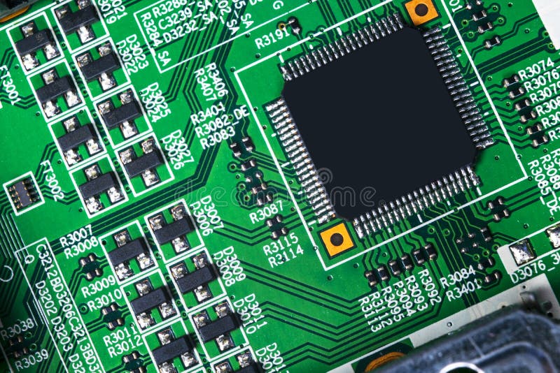 Macro Shot of a Circuitboard with Resistors Microchips and Electronic ...