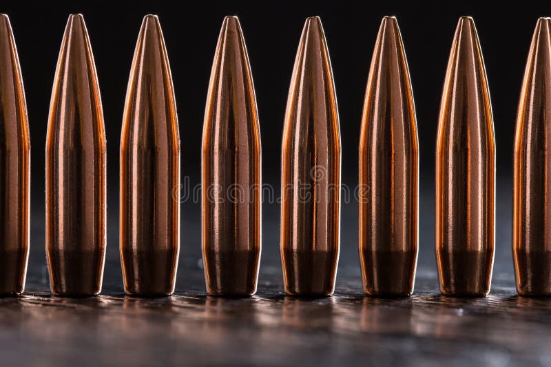 Macro Shot of Copper Bullets that are in One Row Stock Image - Image of ...