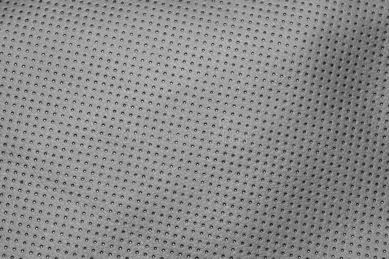 A Macro Shot of Dark Grey Perforated Leather Texture Stock Image ...