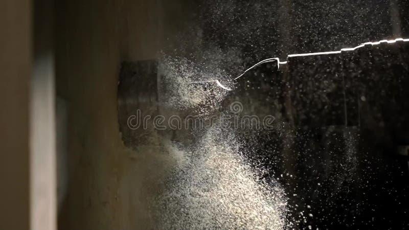 Macro Shot of Drilling Round Hole for Socket on Wall in Dark with Light ...