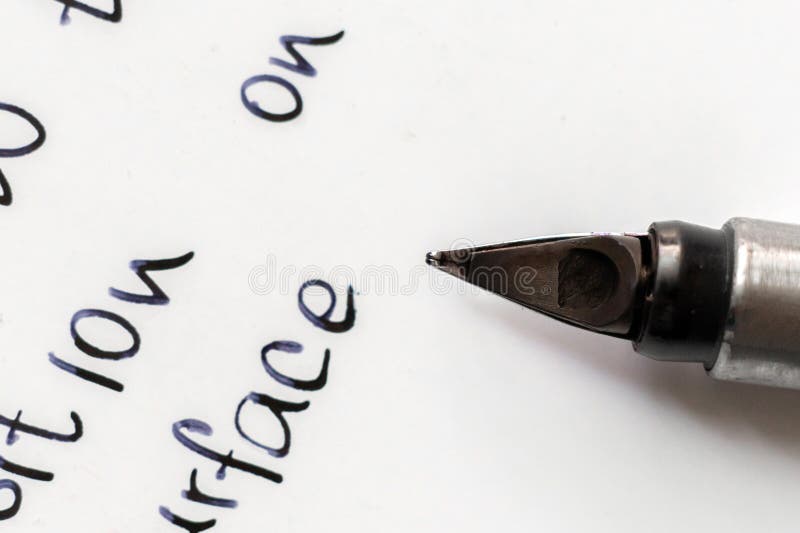 Macro Shot of Fountain Pen Writing on White Surfaces Stock Photo ...