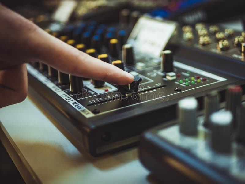 Hand Adjusting Volume Fader Of Digital Audio Mixer. Stock Photo - Image ...