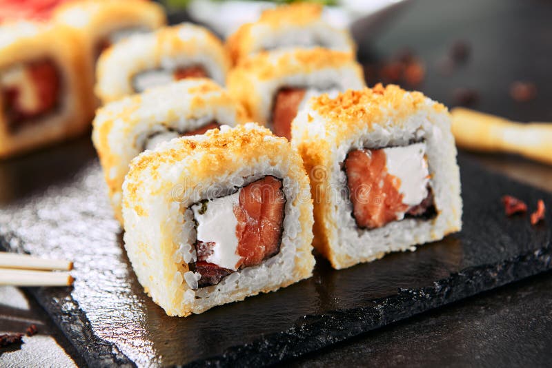 Macro Shot Of Hot Crispy Tempura Maki Sushi Rolls With Cream Cheese