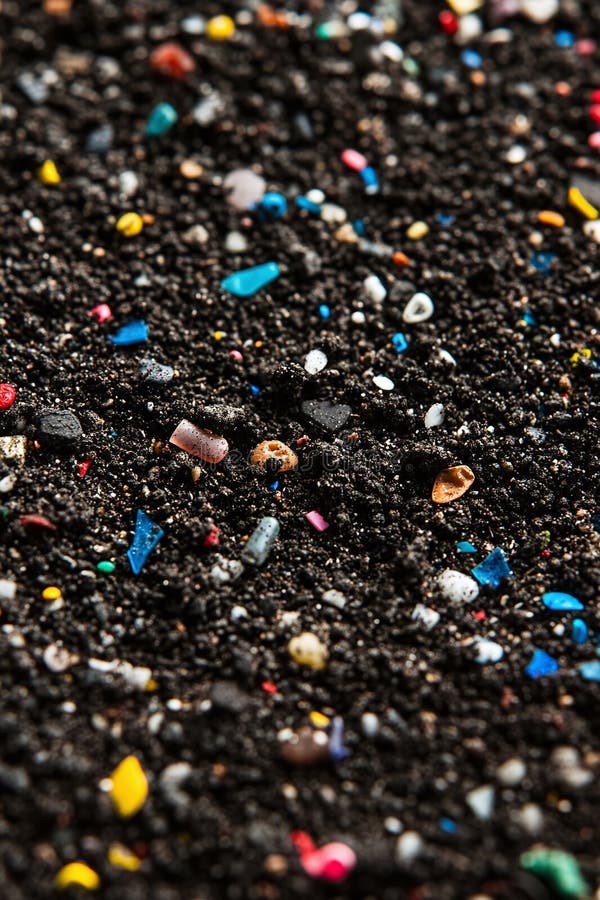 A Macro Shot of Microplastics Mixed into Soil or Sand. Stock ...