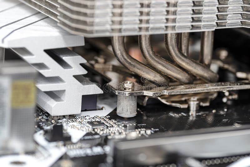 Macro Shot of a Modern Desktop Motherboard with a Heatsink Mounted on ...