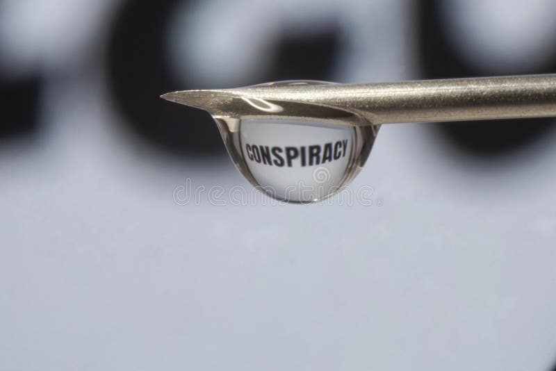 Shot of a Needle with Conspiracy Text Reflecting on a Water Drop Stock ...