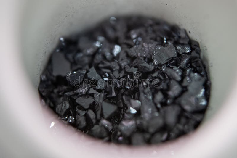 Macro Shot of Pure Cadmium Telluride Element Crystals in a Container ...