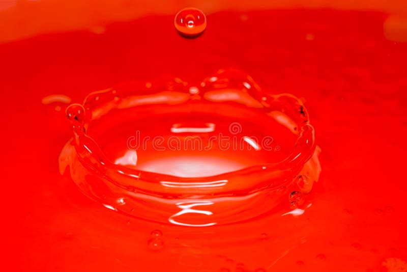 Macro Shot of Red Water Droplet - Perfect for Wallpaper Stock Photo ...