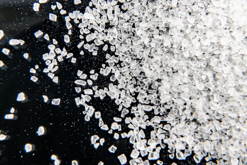 Macro Shot of Salt Crystals on Black Mirror Surface, Reflections B ...