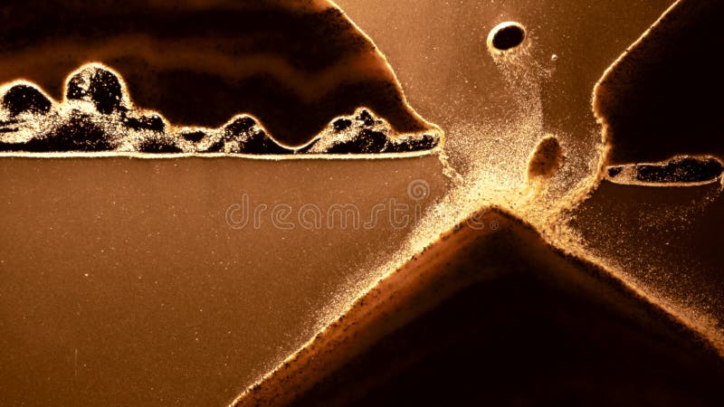Macro Shot of Sand Particles Falling Down, Creating Abstract Patterns ...