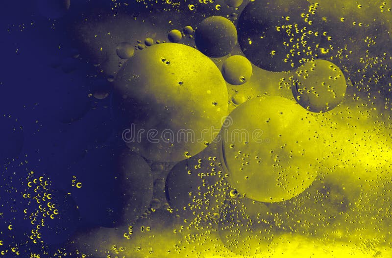 Macro Shot of Water Oil Emulsion Over Colored Background Stock Photo ...