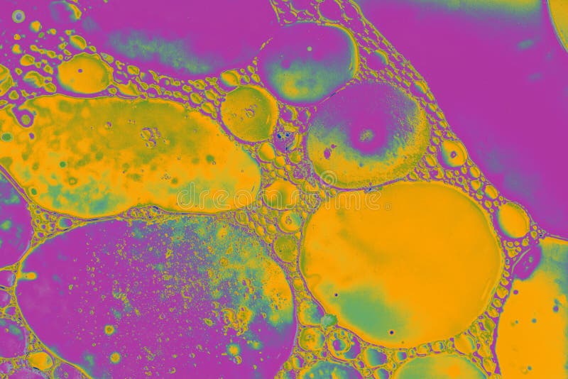 Macro Shot of Water Oil Emulsion Over Colored Background Stock Image ...