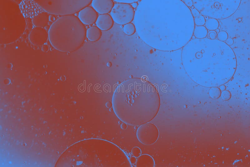Macro Shot of Water Oil Emulsion Over Colored Background Stock Image ...