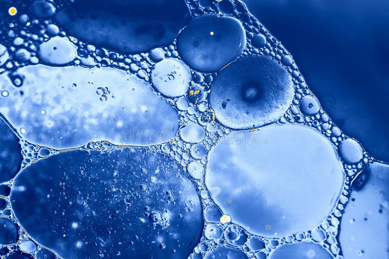 Macro Shot of Water Oil Emulsion Over Colored Background Stock Image ...