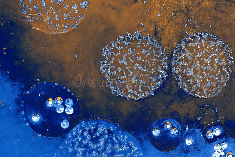 Macro Shot of Water Oil Emulsion Over Colored Background Stock Photo ...