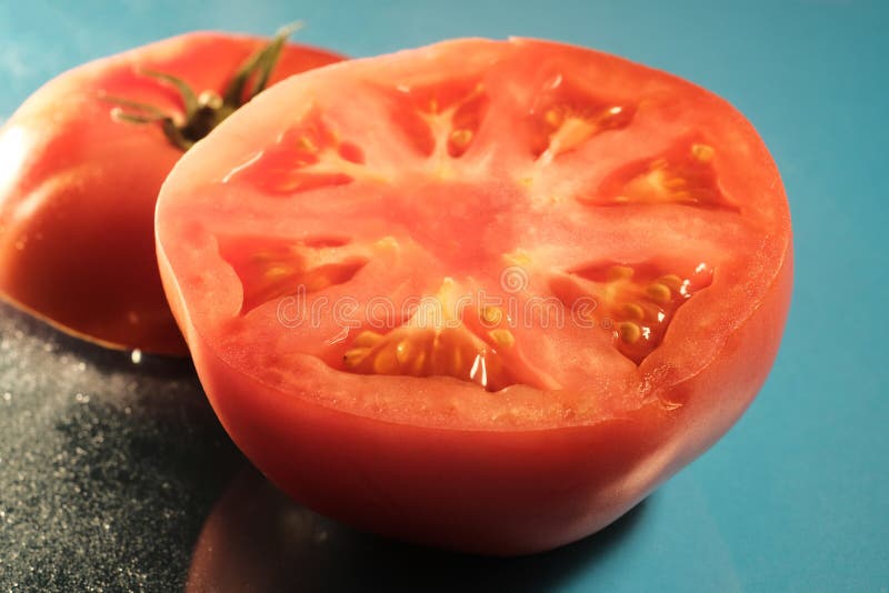 Macro Sliced Tomato stock photo. Image of seeds, ingredient - 238274888