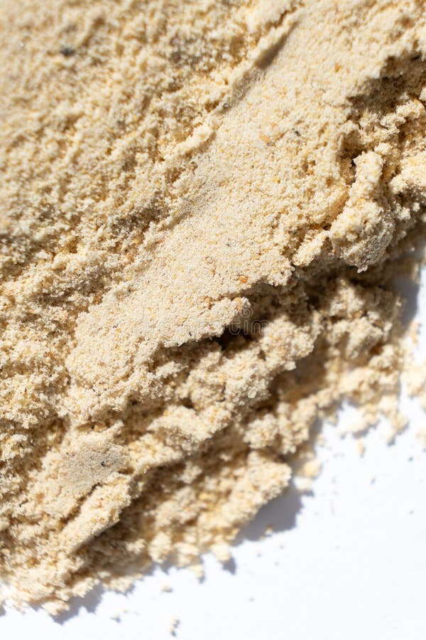 Macro Spilled Ginger Powder, Ground Ginger Root on a White Background ...