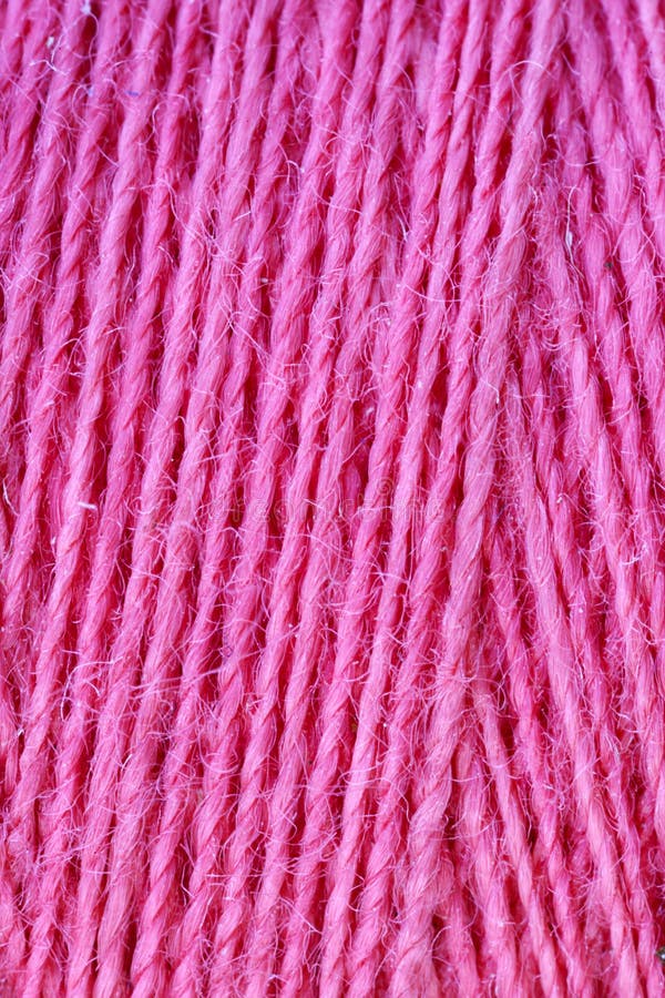 The Macro Texture of Red Cotton Thread on Bobbin, Close-up,. Stock ...
