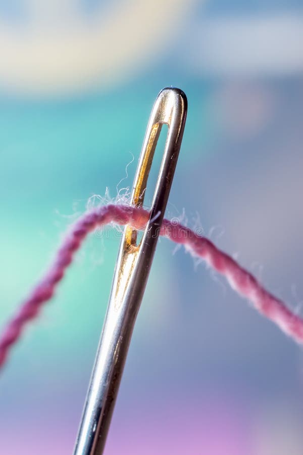 Thread through needle hole stock photo. Image of white - 7957858