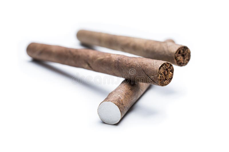 Macro of Two Cigarillos on Top of a Single Cigarillo Isolated on White ...