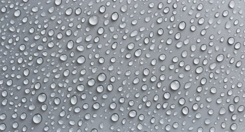 A Macro View of Clear Water Droplets on a Smooth Grey Surface Stock ...