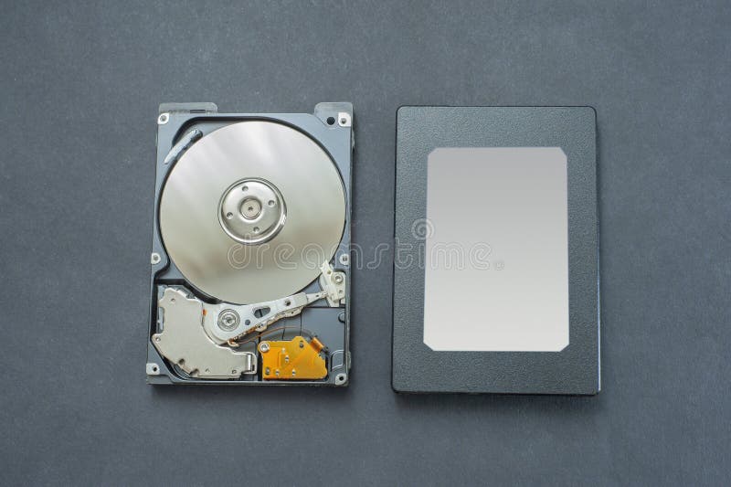 Macro View of an HDD Head Resting on a Disk Platter and Its Reflection ...