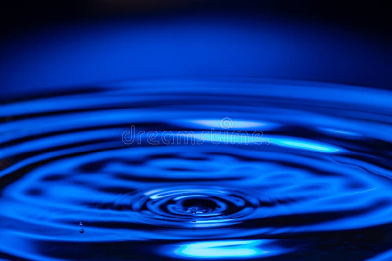 Macro Water Drop on a Blue Background and Circles on it. Round Water ...