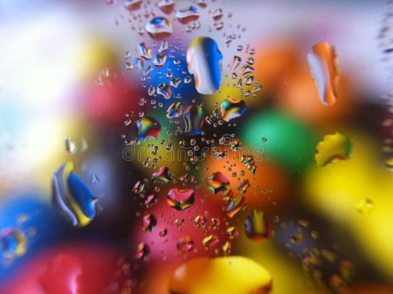 Macro of Water Drops on Multicolor Background. Drops of Water on the ...