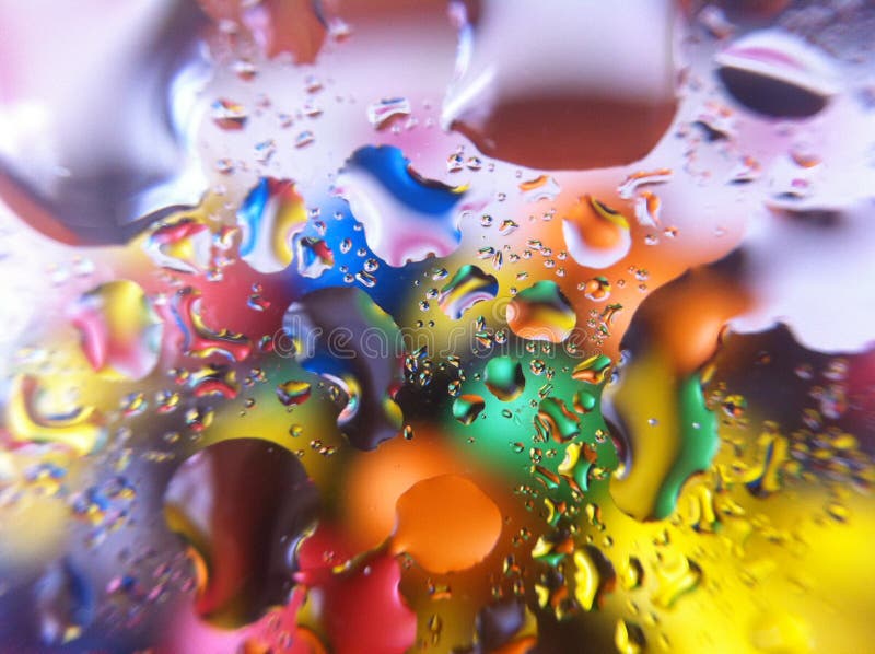 Macro of Water Drops on Multicolor Background. Drops of Water on the ...