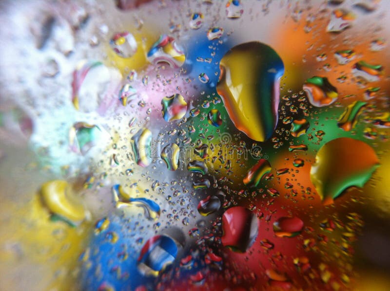 Macro of Water Drops on Multicolor Background. Drops of Water on the ...