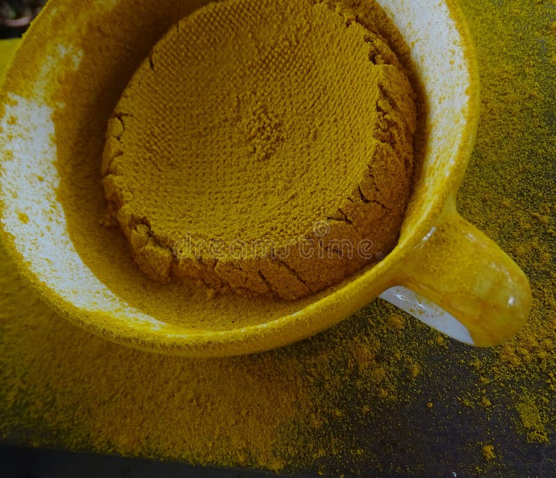 Turmeric in cup stock photo. Image of produce, reaching - 211684790
