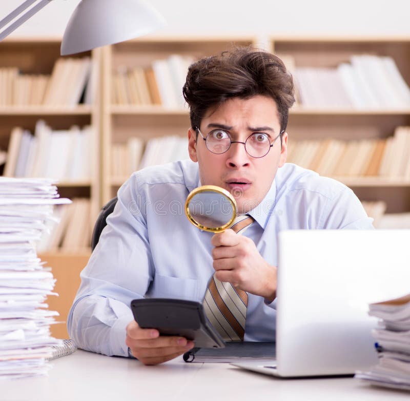 The Mad Auditor Looking for Errors in the Report Stock Photo - Image of ...