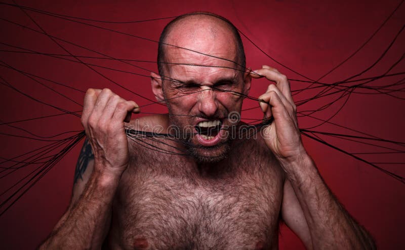 Mad Bald Man in Black Threads on Red Background Stock Photo - Image of ...