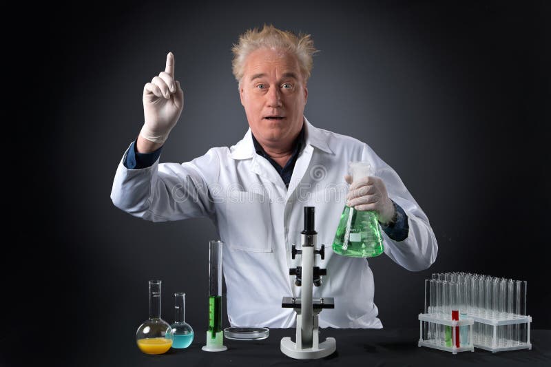 Scientist Holding Two Lamps Up in Both Hands. Stock Photo - Image of ...