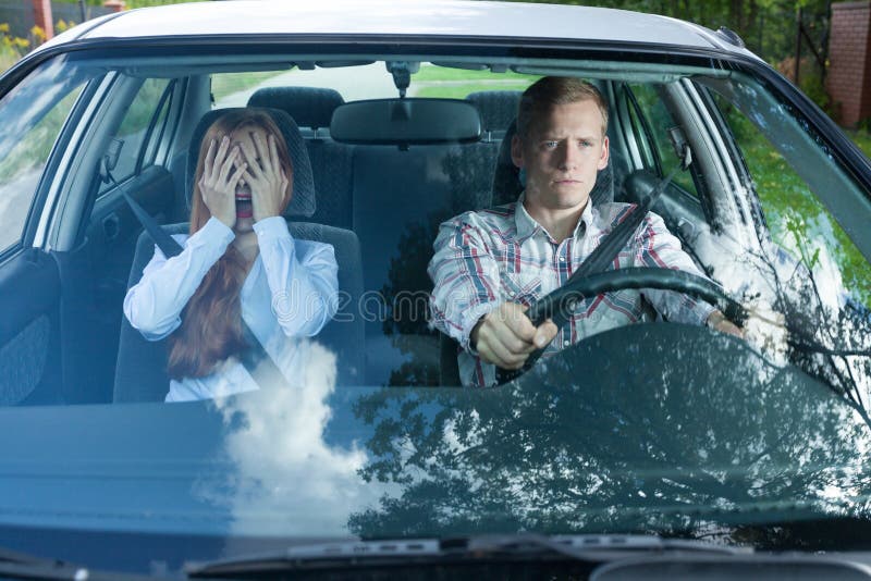 Mad couple in a car stock photo. Image of driving, active - 44860552