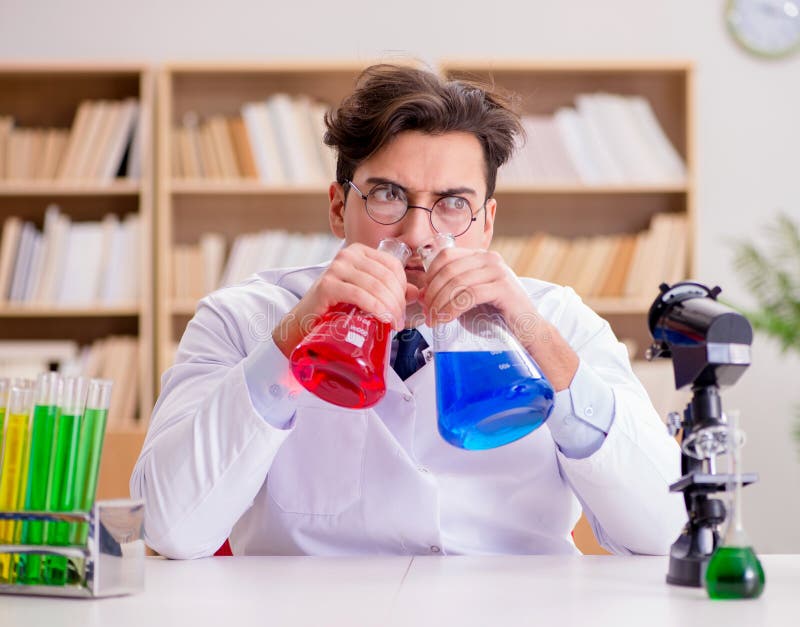 Mad Crazy Scientist Doctor Doing Experiments in a Laboratory Stock ...
