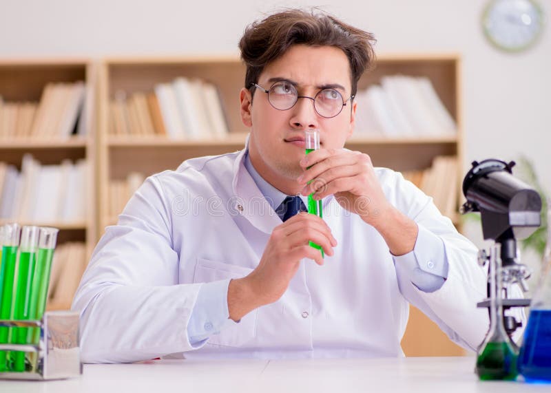 Mad Crazy Scientist Doctor Doing Experiments in a Laboratory Stock ...