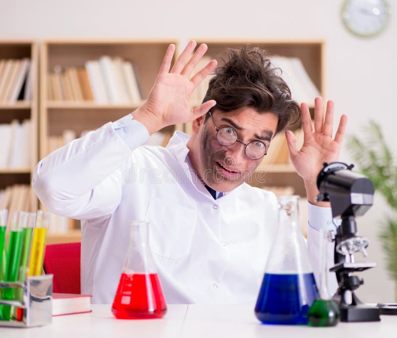 Mad Crazy Scientist Doctor Doing Experiments in a Laboratory Stock ...