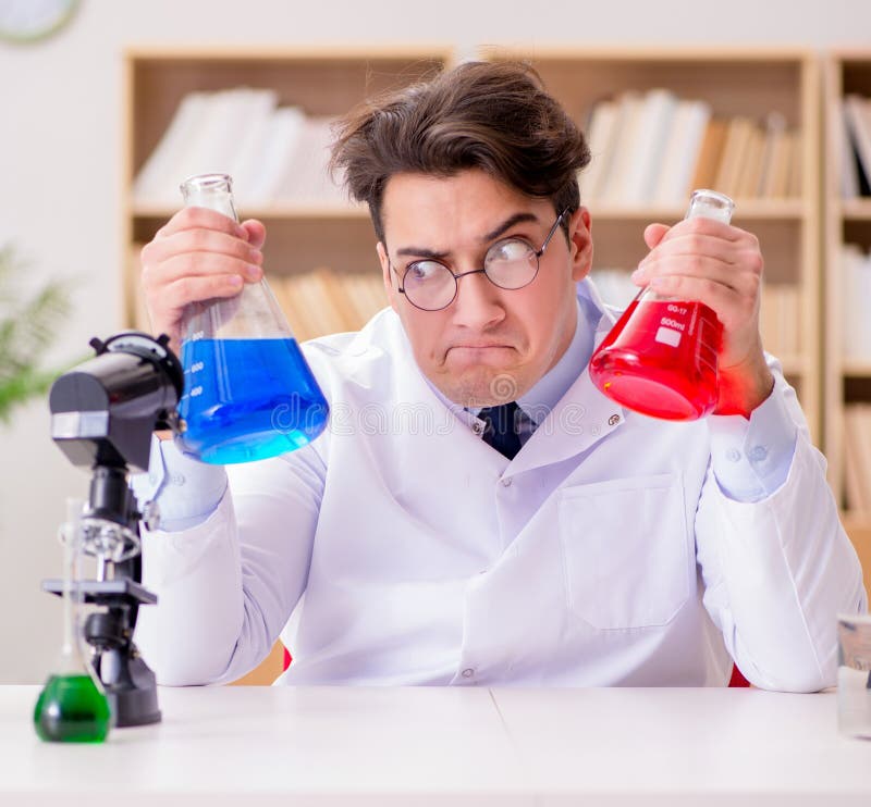 Mad Crazy Scientist Doctor Doing Experiments in a Laboratory Stock ...