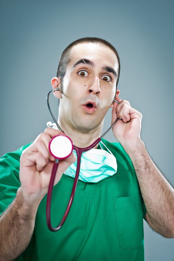 Mad Doctor with a Syringe stock photo. Image of medical - 32413330