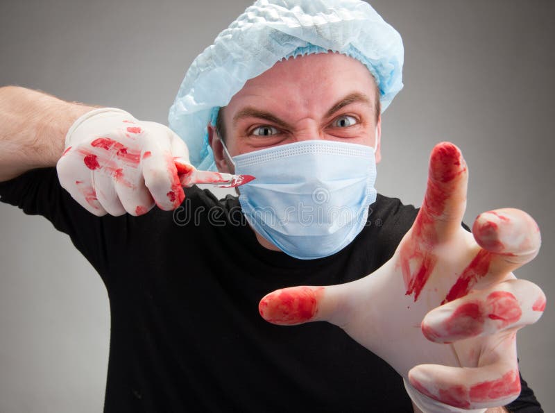 Mad sick surgeon stock photo. Image of hands, gloves - 18786336