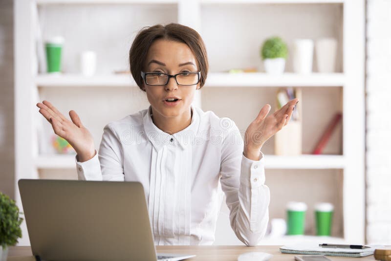 Mad woman at workplace stock image. Image of confused - 79362903