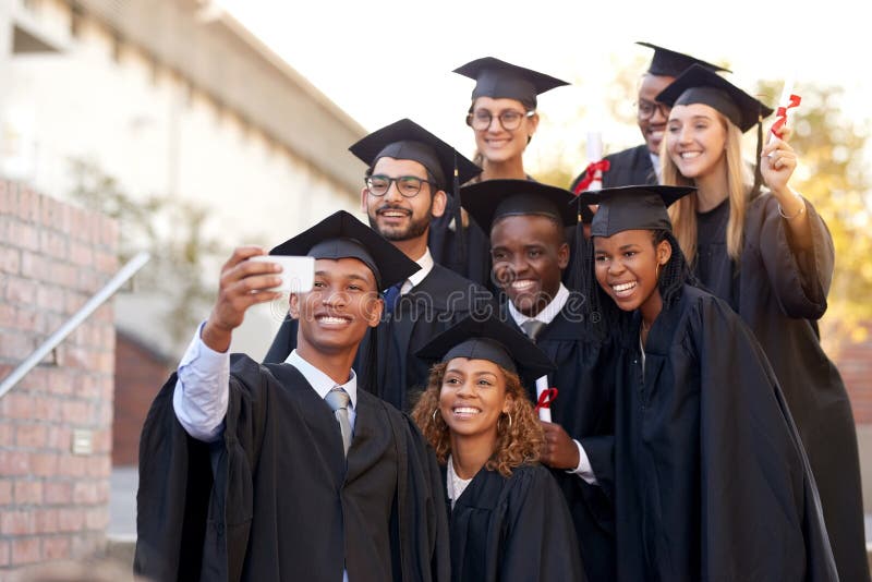 We Made it Big. a Group of Students Taking Selfies on Graduation Day ...