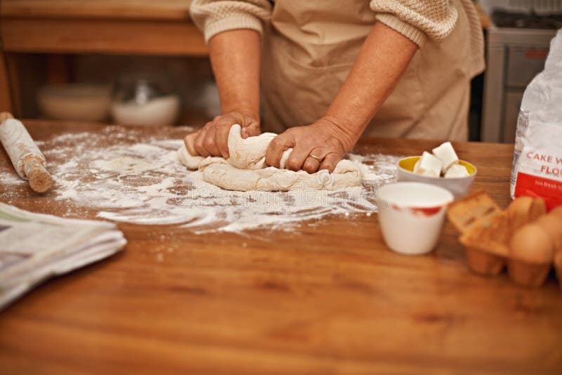 Made with Love.... a Cropped View of Hands Working the Dough while ...