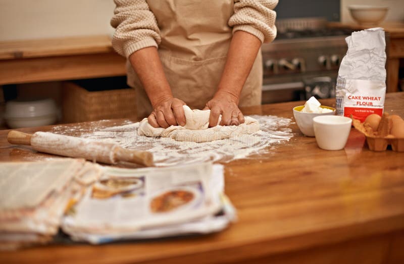 Made with Love...a Cropped View of Hands Working the Dough while Baking ...