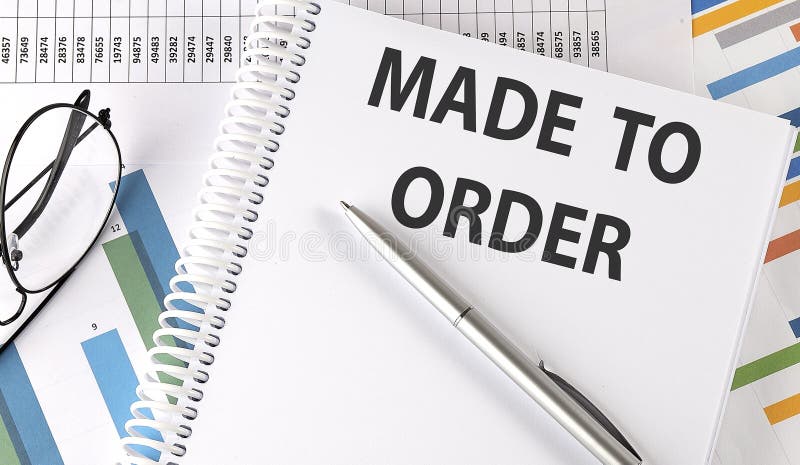 MADE TO ORDER Text , Pen and Glasses on Chart Stock Photo - Image of ...